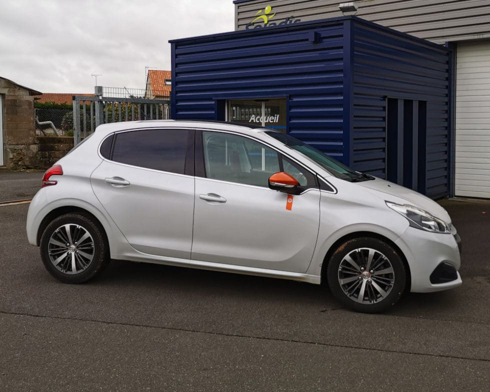 Aménagement de commandes au volant sur Peugeot 208 - Sojadis